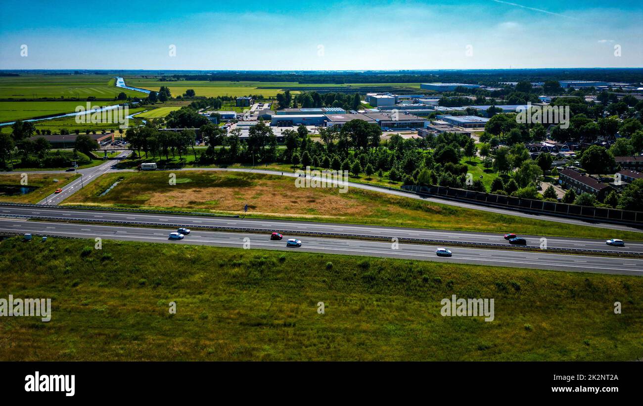 An aerial view of the traffic on A32 highway near Heerenveen town in ...