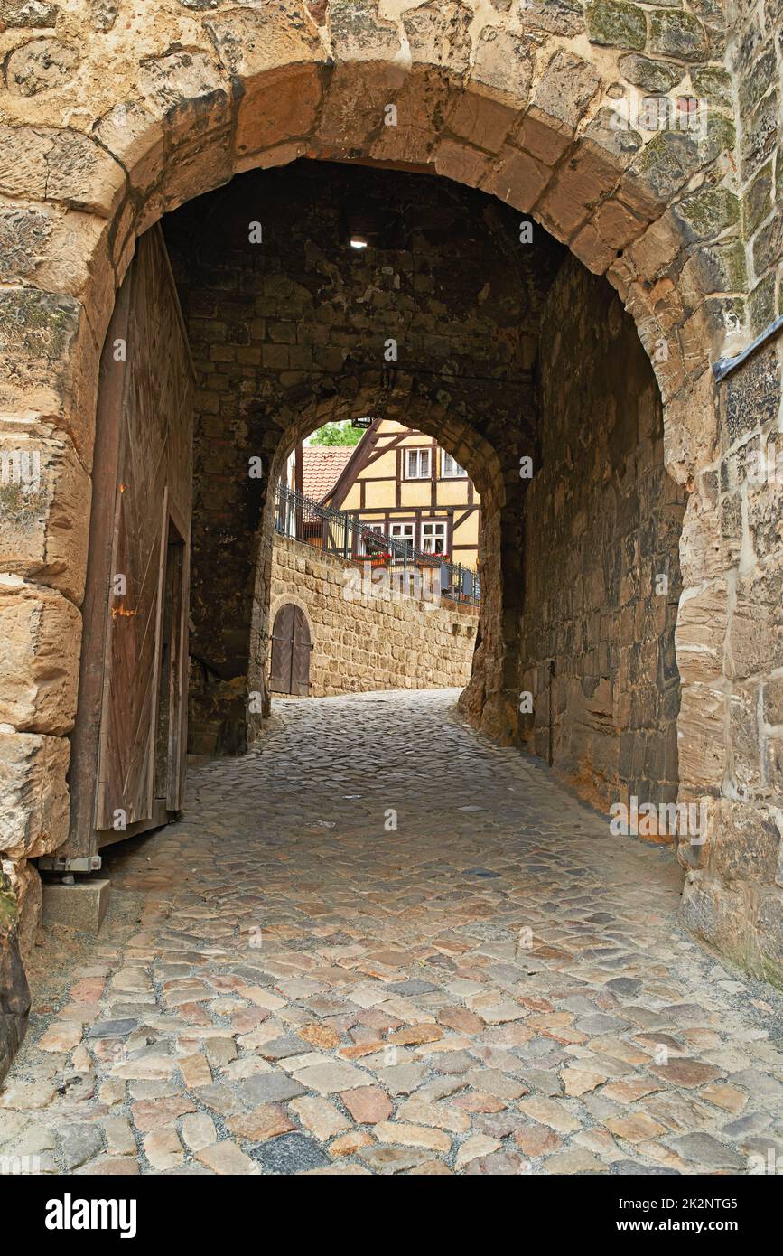 Ancient archway. An arched passageway leading into an ancient part of ...