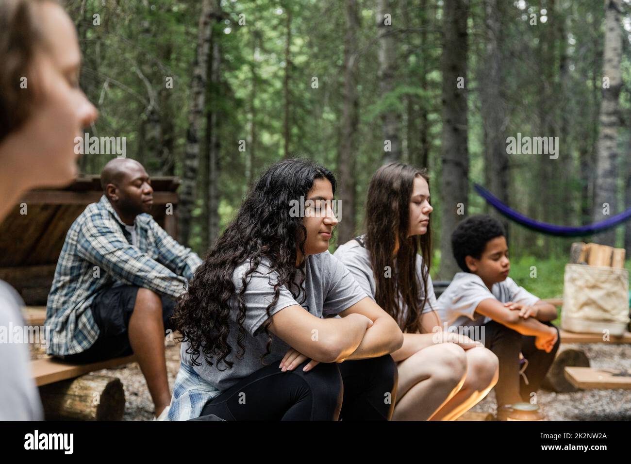 Sitting at campfire hi-res stock photography and images - Alamy