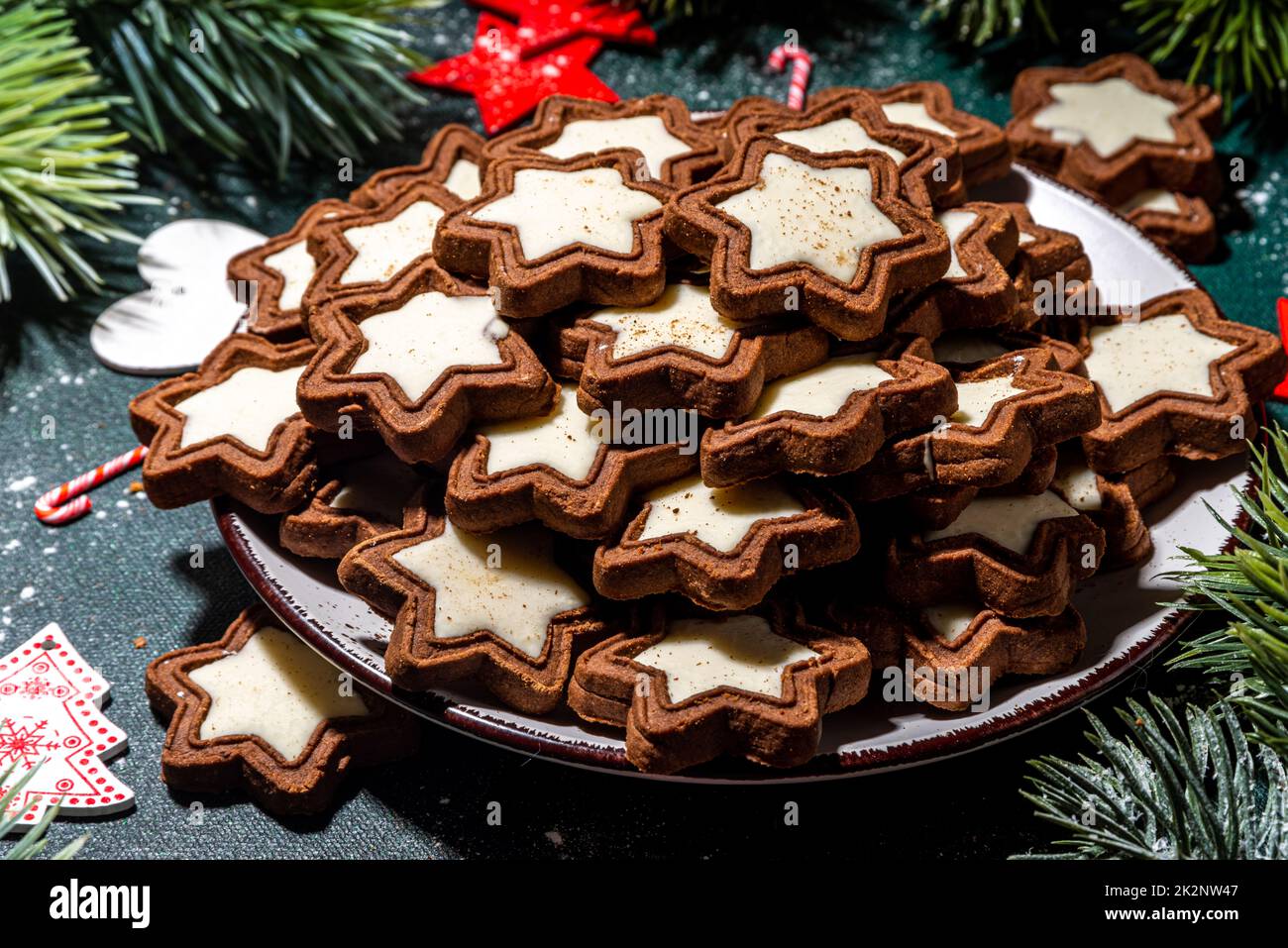 Christmas star sugar glazed cookies, traditional Xmas dark and white ...