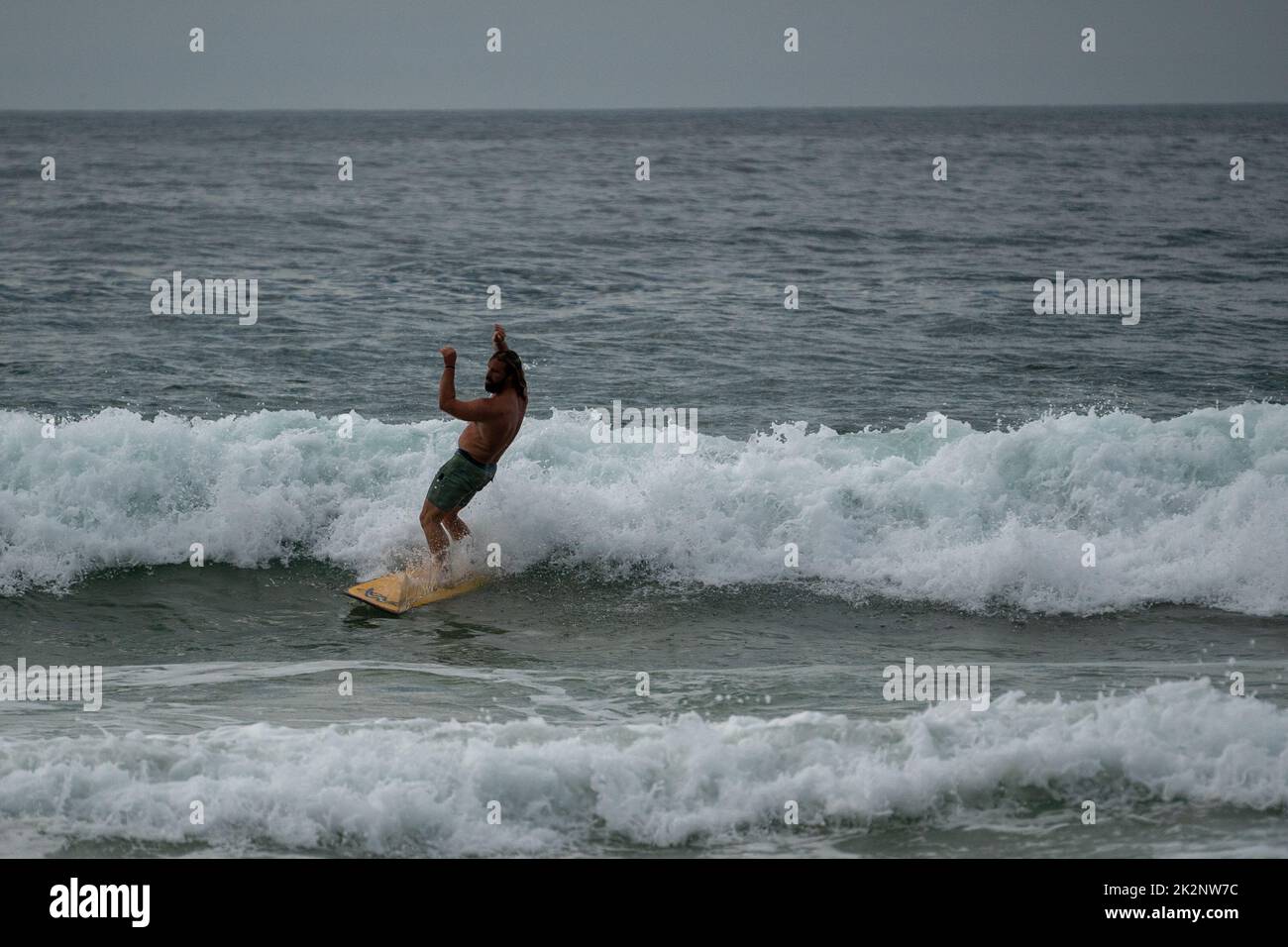 The surfer catching waves and having fun on Manly Beach. Australia ...
