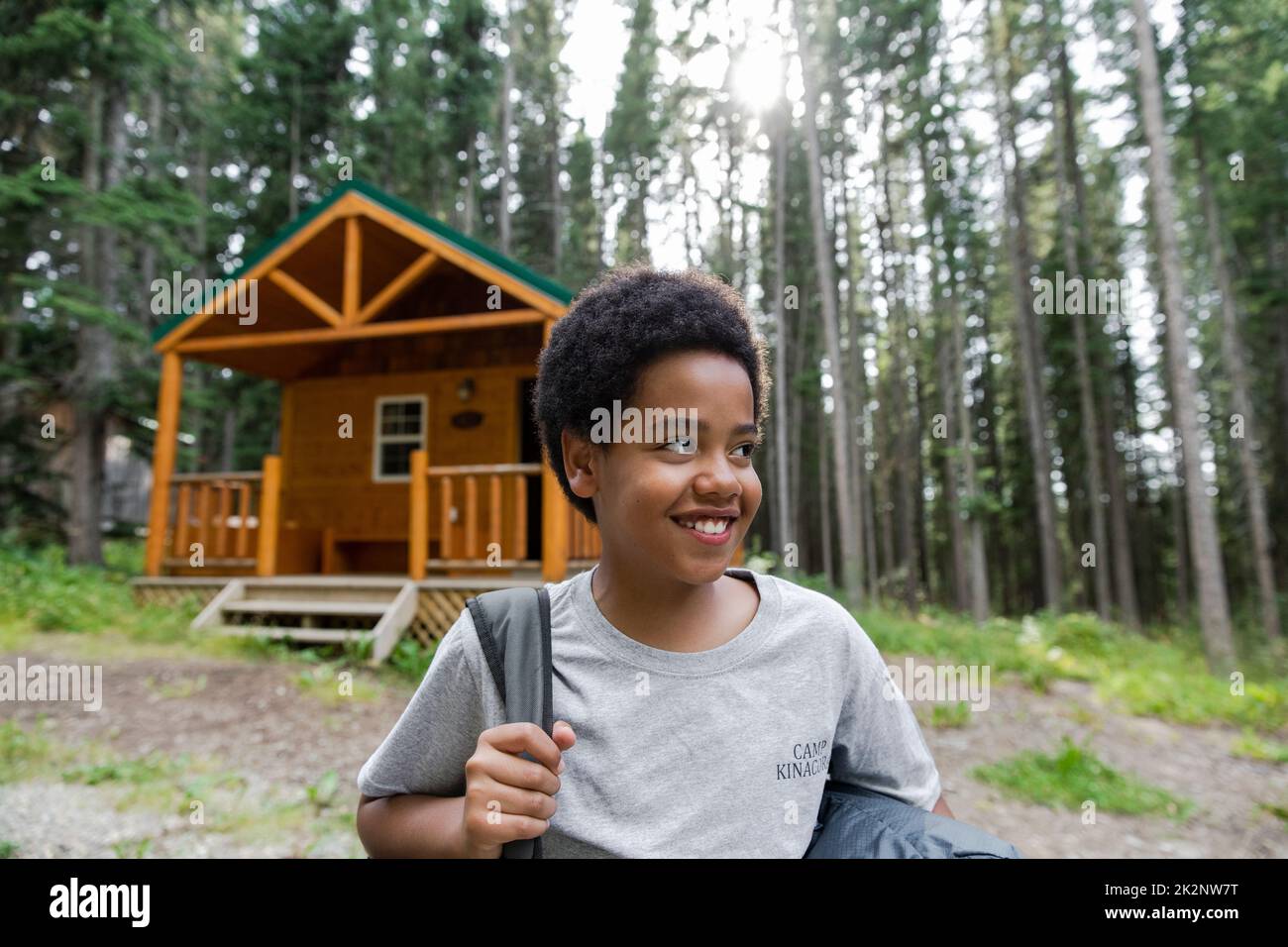 Boy smile backpack hi-res stock photography and images - Alamy