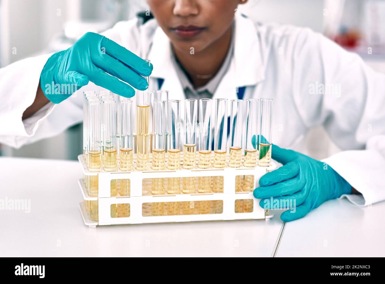 The experiment with the gold liquids.... Cropped shot of an ...