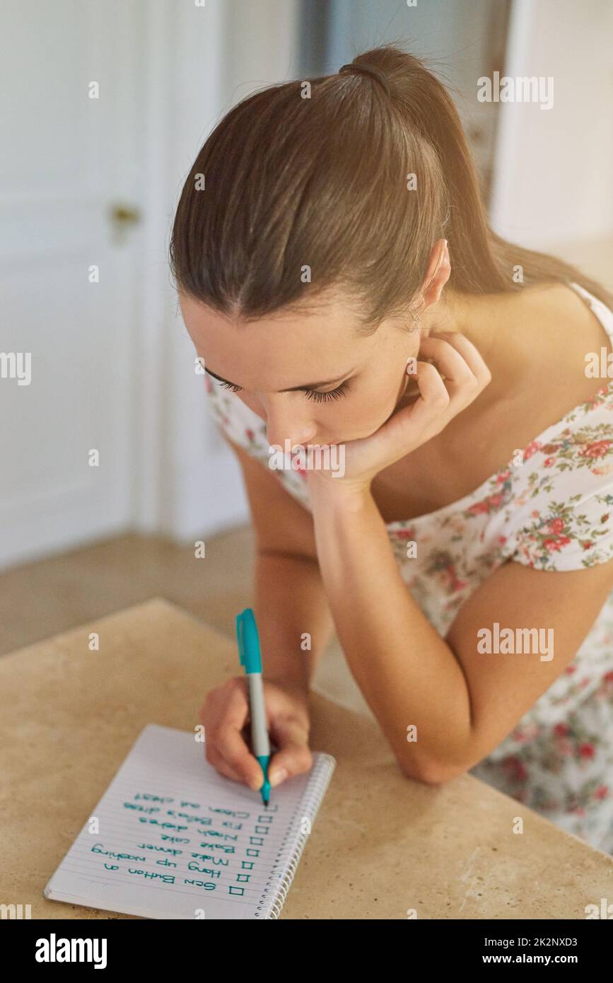 Woman and writing list hi-res stock photography and images - Alamy
