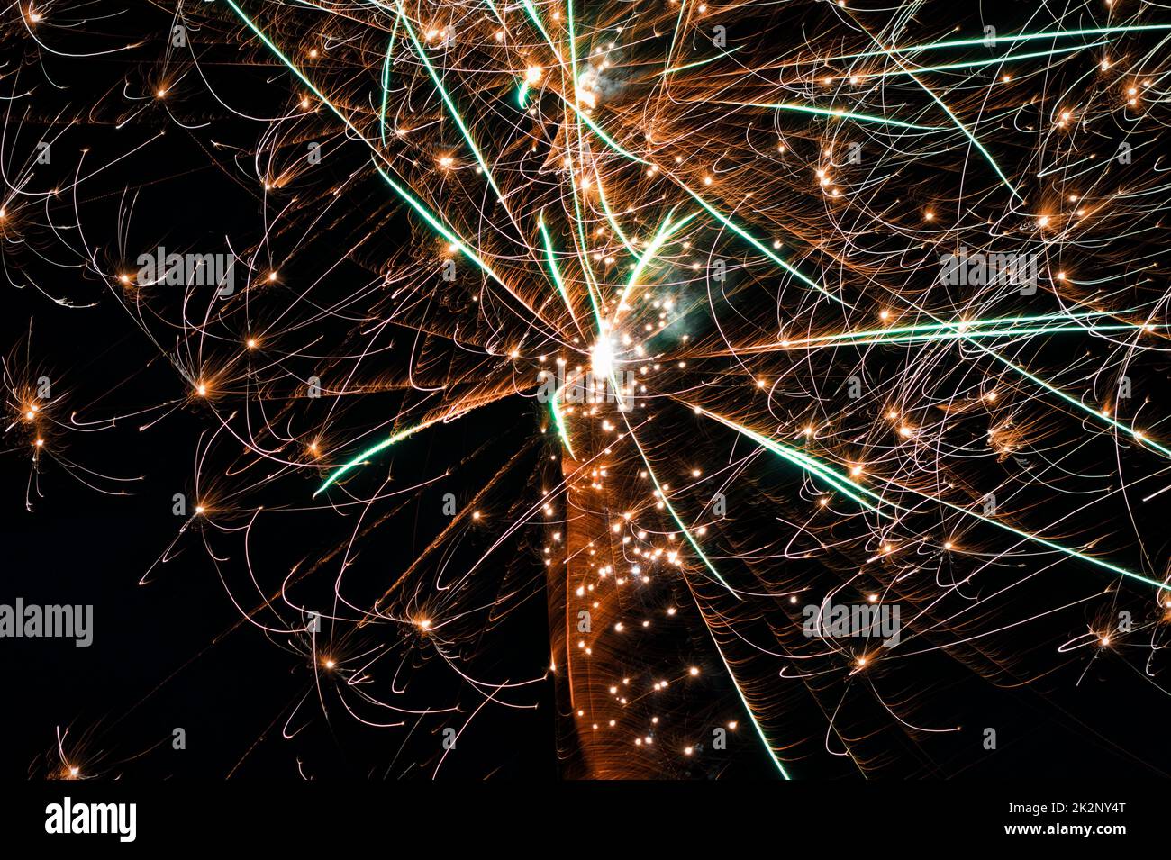 A low angle shot of fireworks with long exposure at night - great for ...
