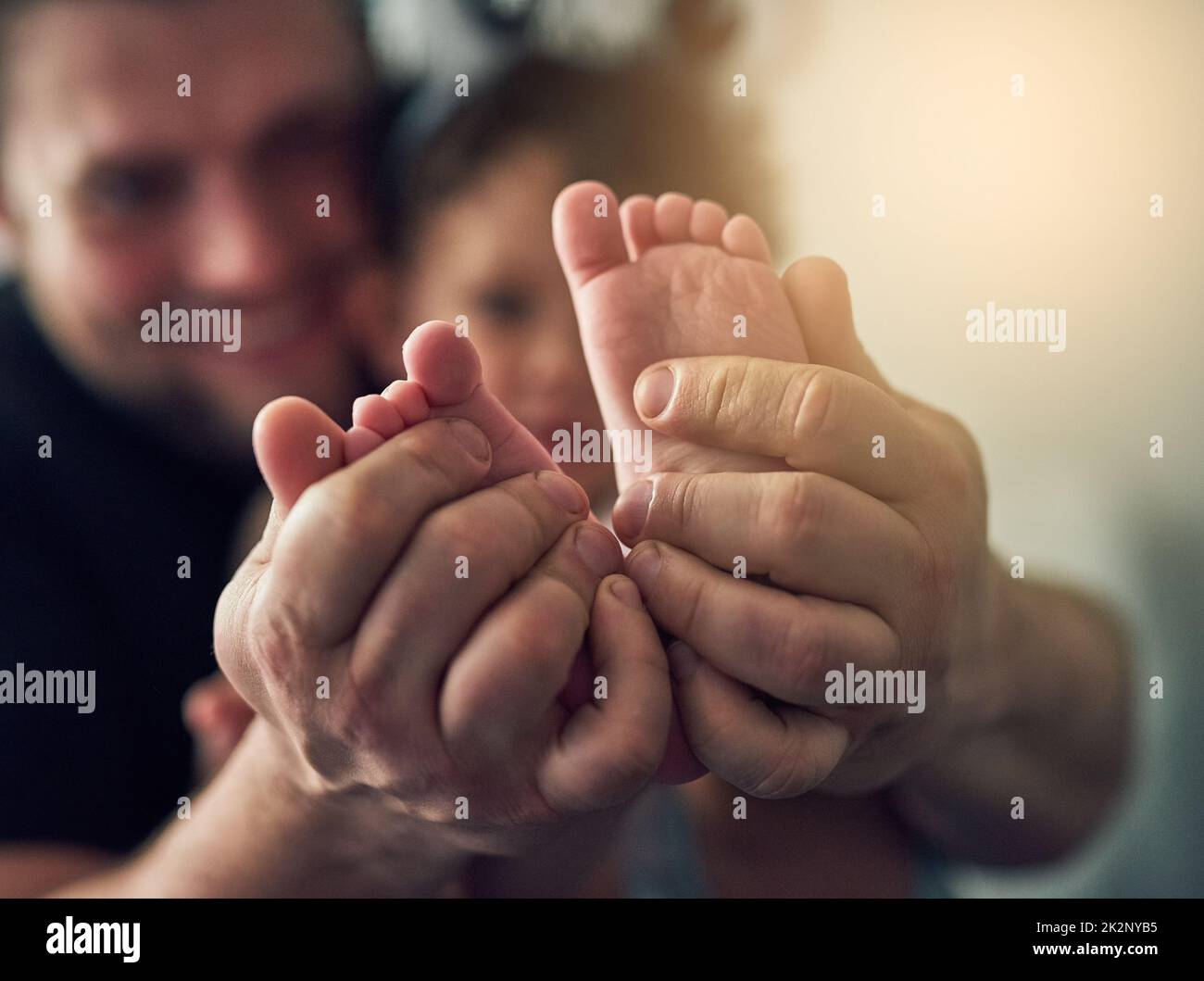 Closeup child adult together feet hi-res stock photography and images ...