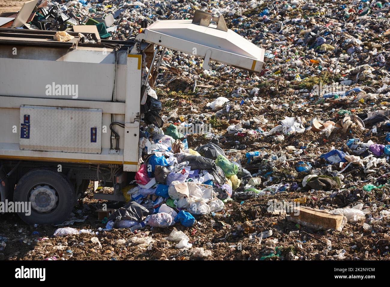 Truck unloading garbage on an open air dump. Waste recycling Stock ...