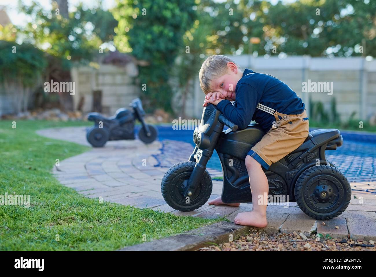 I have nobody to play with. Full length portrait of an adorable little ...