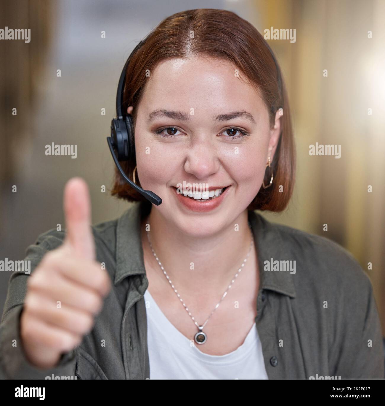 Call center office thumbs hi-res stock photography and images - Alamy