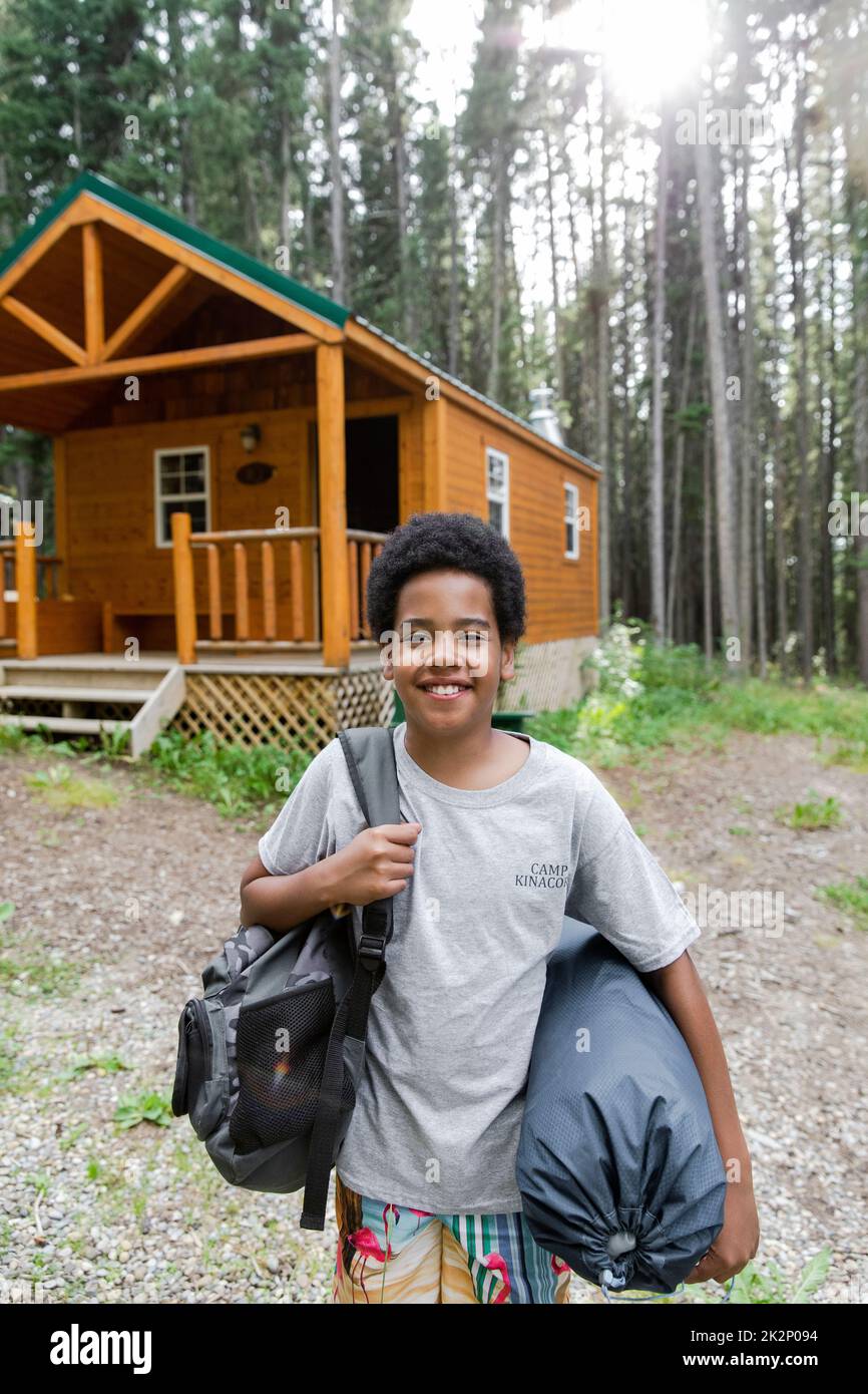 Boy smile backpack hi-res stock photography and images - Alamy