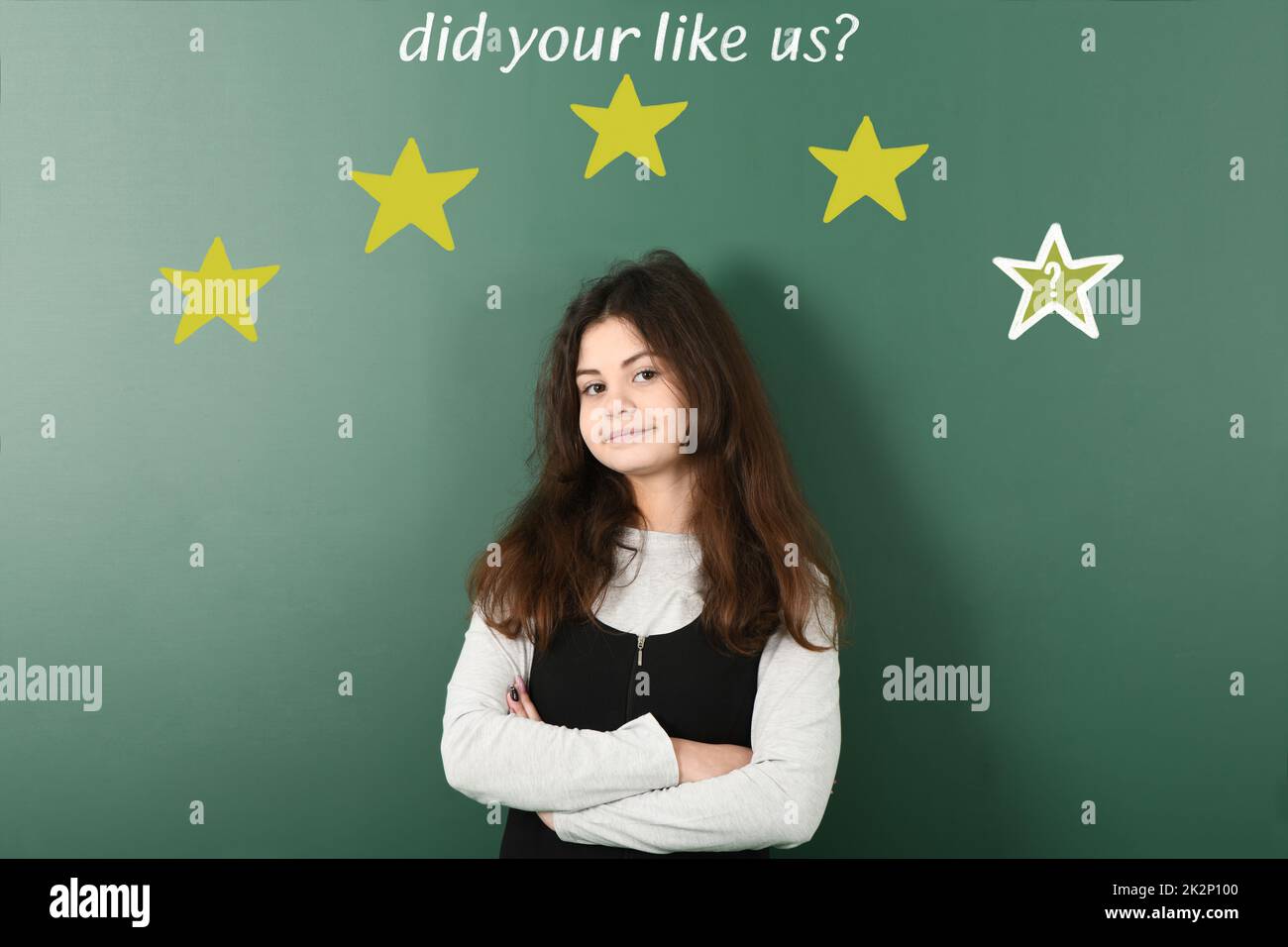 Rate us for 5 stars consumer review. Smiling schoolgirl folded hands ...