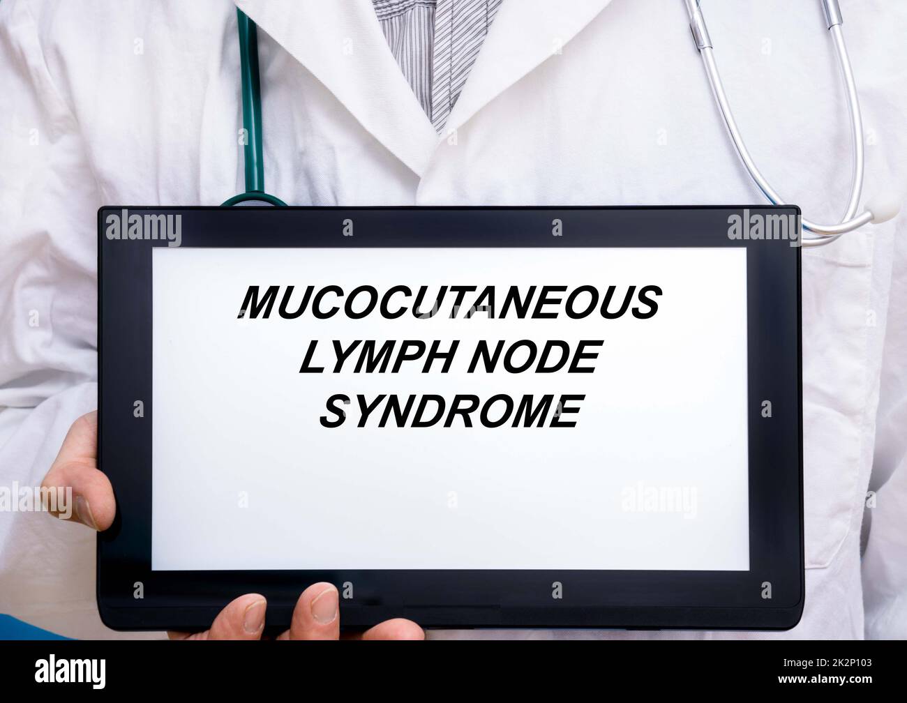 Mucocutaneous Lymph Node Syndrome Doctor With Rare Or Orphan Disease Text On Tablet Screen