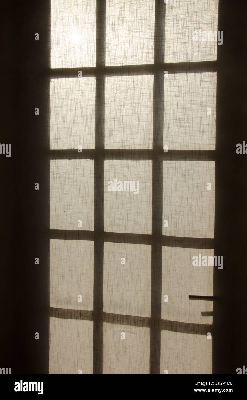 Door covered with a net curtain Stock Photo - Alamy