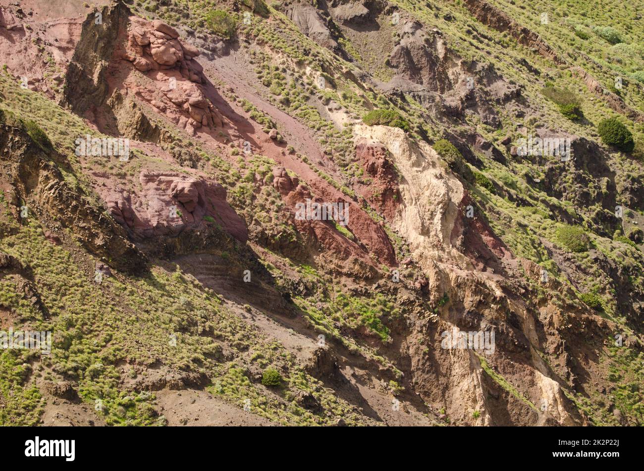Slope with different strata Stock Photo - Alamy