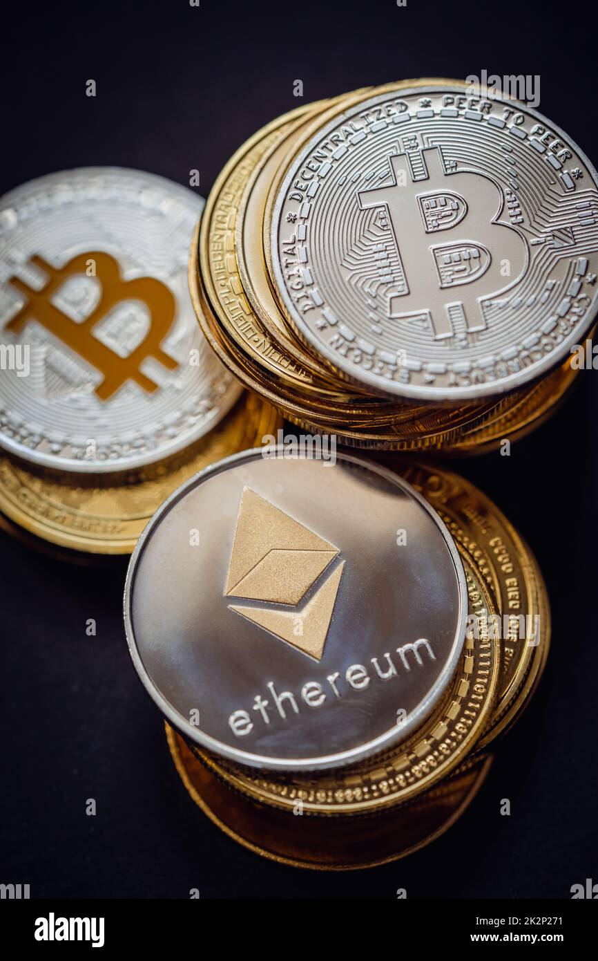 Bitcoin and Ethereum digital cryptocurrency Stock Photo - Alamy