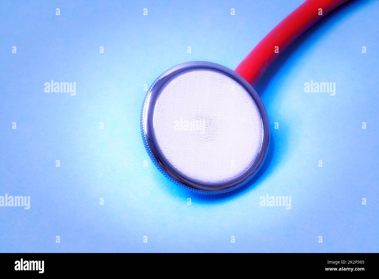 Red stethoscope, close up and still life of a modern stethoscope for ...