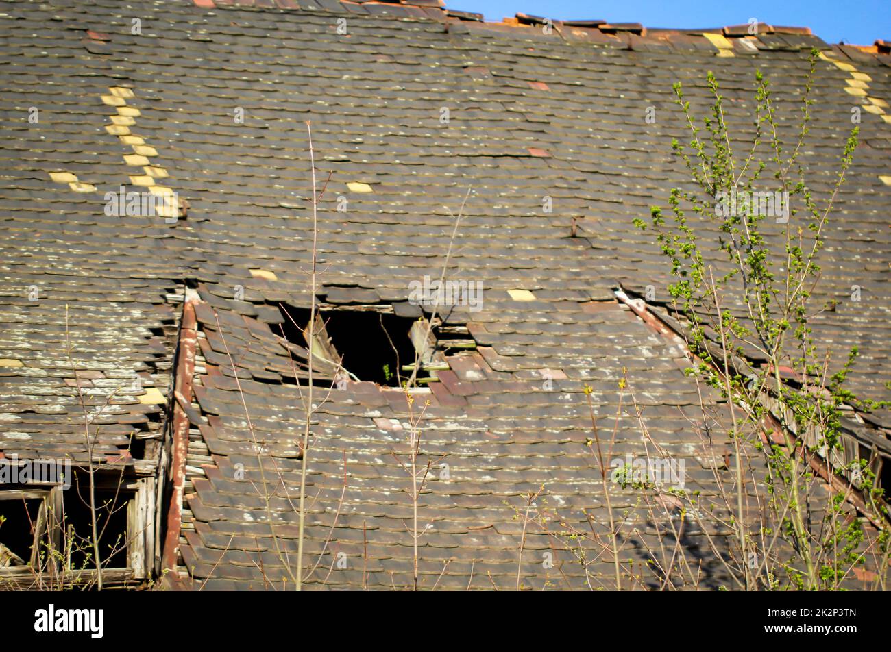 An example of roof damage. A roof that is subject to decay Stock Photo ...