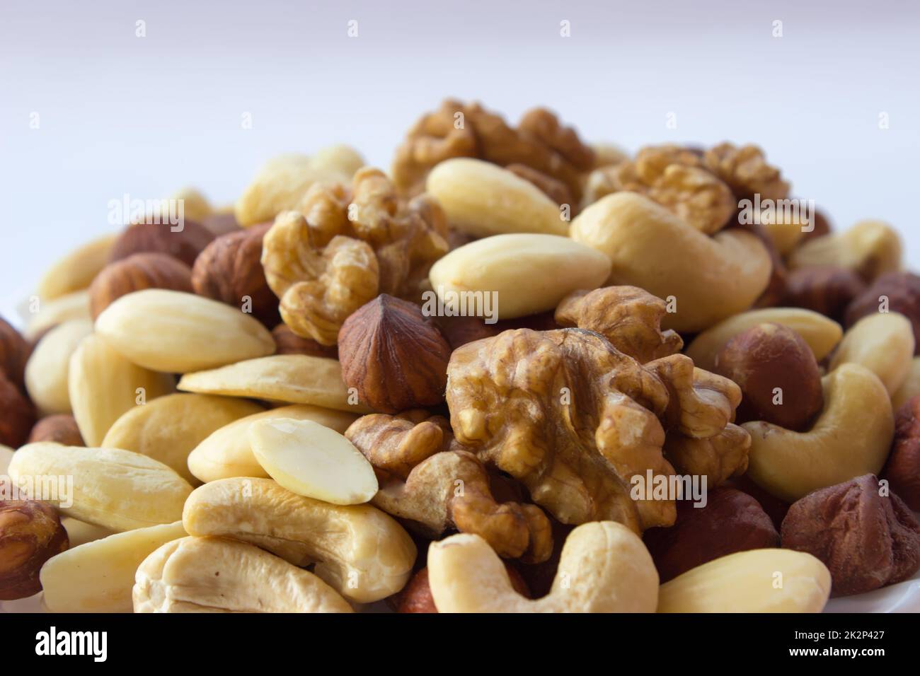 Nuts mixture hazelnut almonds walnuts cashew Stock Photo - Alamy