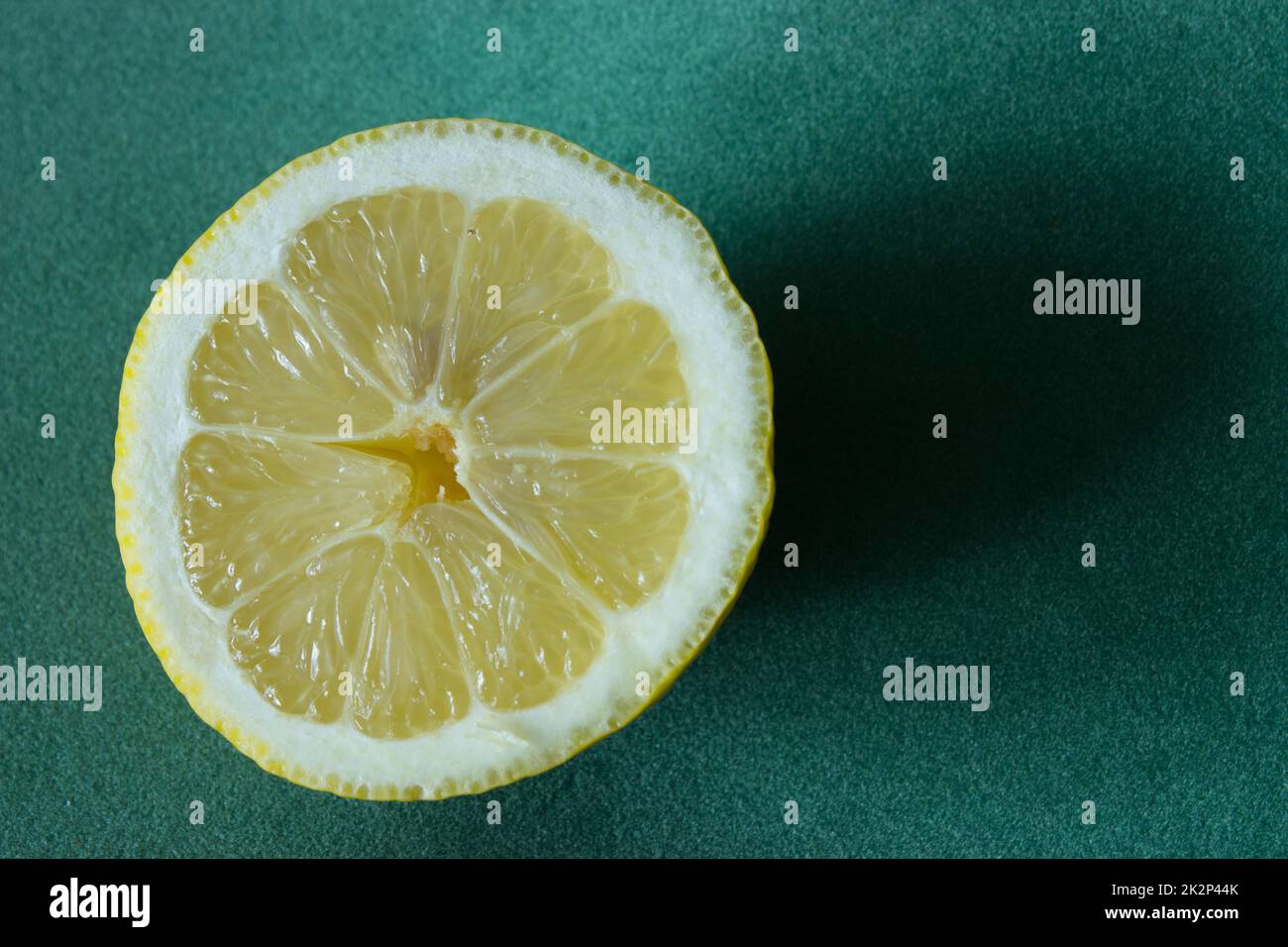 Lemon cut in half Stock Photo - Alamy