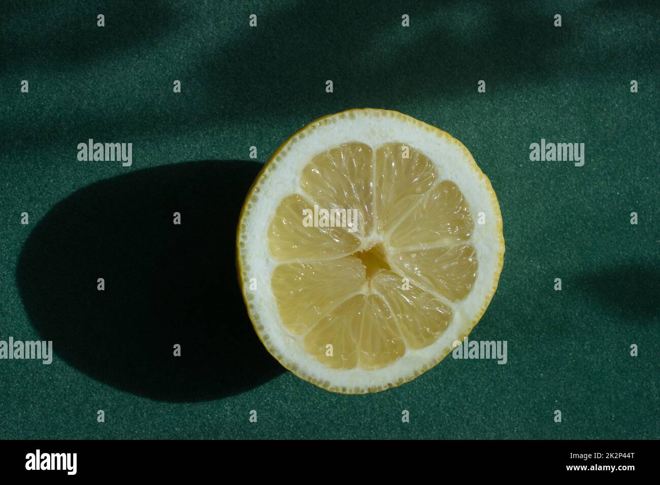 Lemon cut in half Stock Photo - Alamy