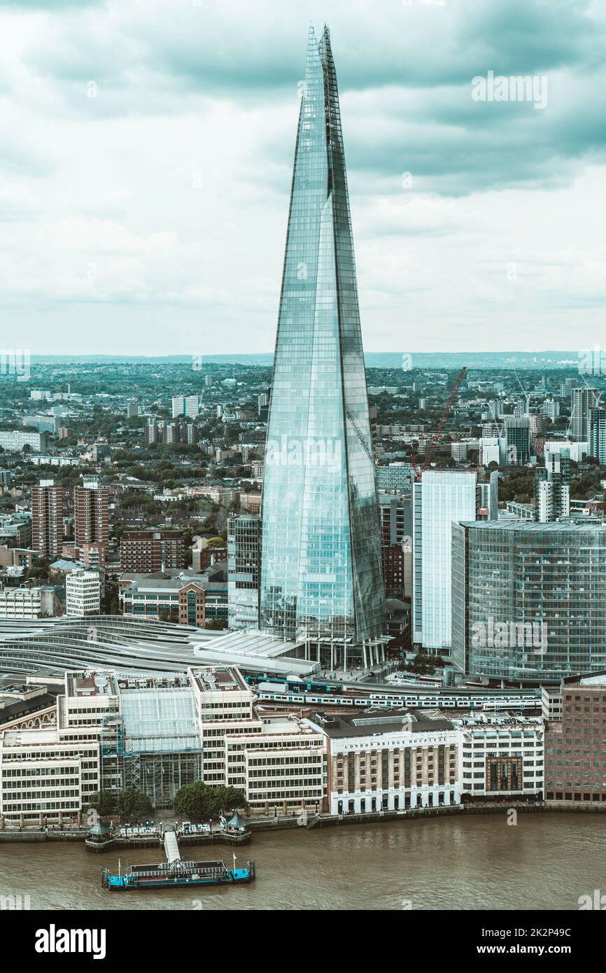 A vertical shot of The Shard Building, also called the Shard of Glass ...