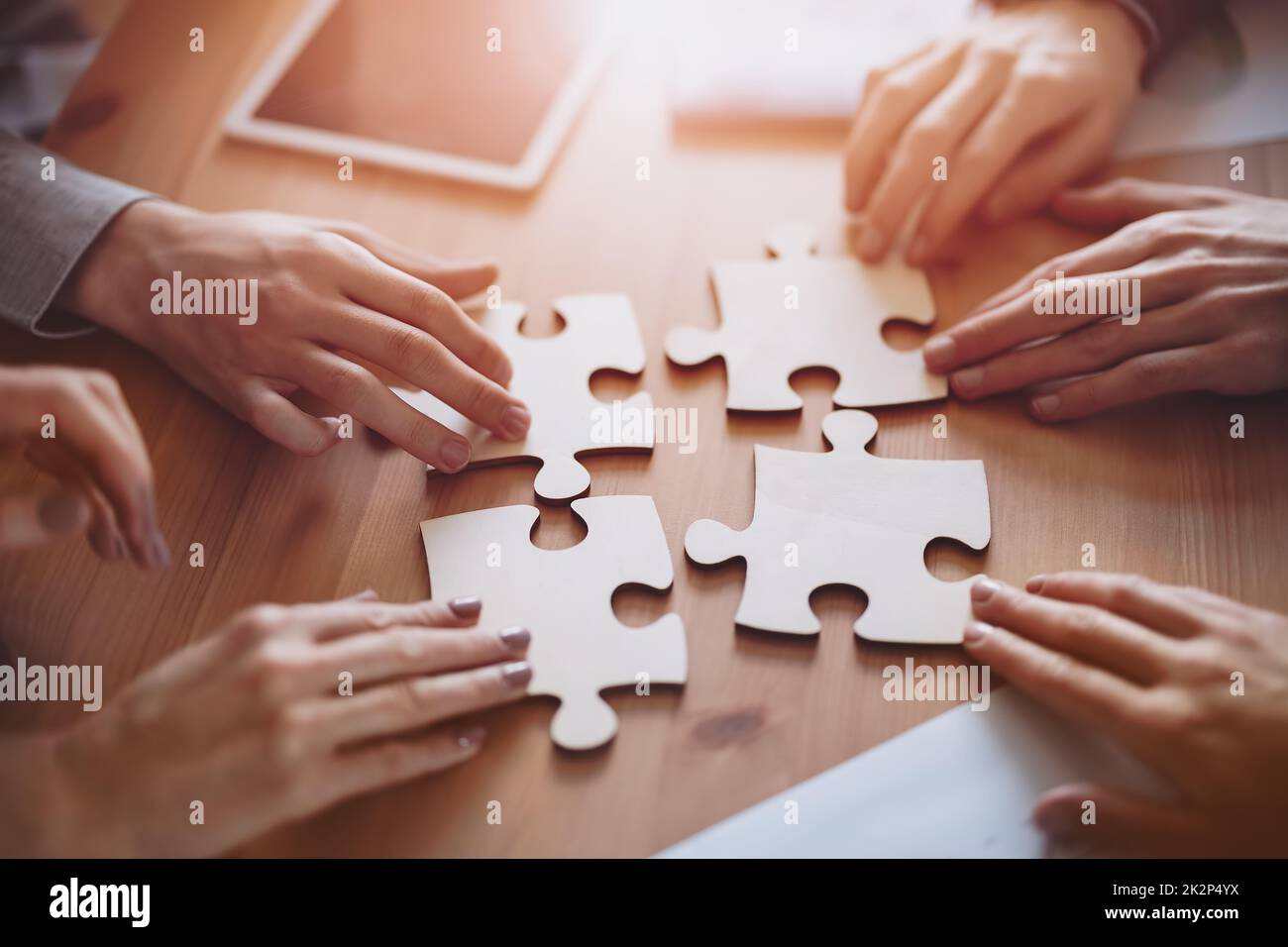 Team work puzzles hi-res stock photography and images - Alamy