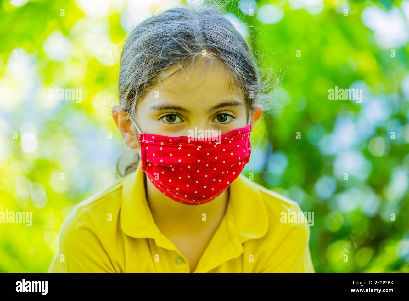 Little girl with mask Stock Photo - Alamy