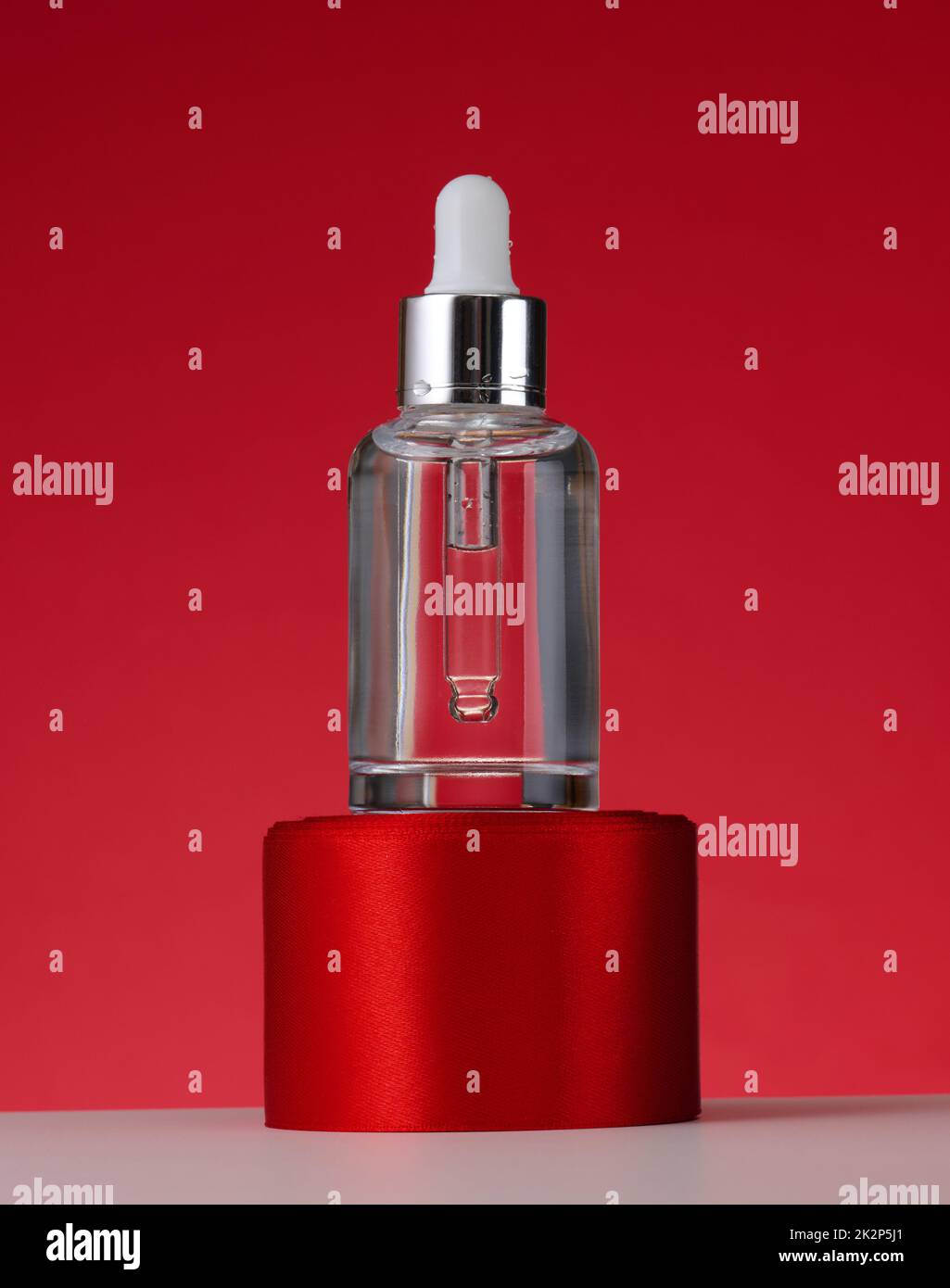 white glass bottle with pipette for cosmetics, oils and serum ...