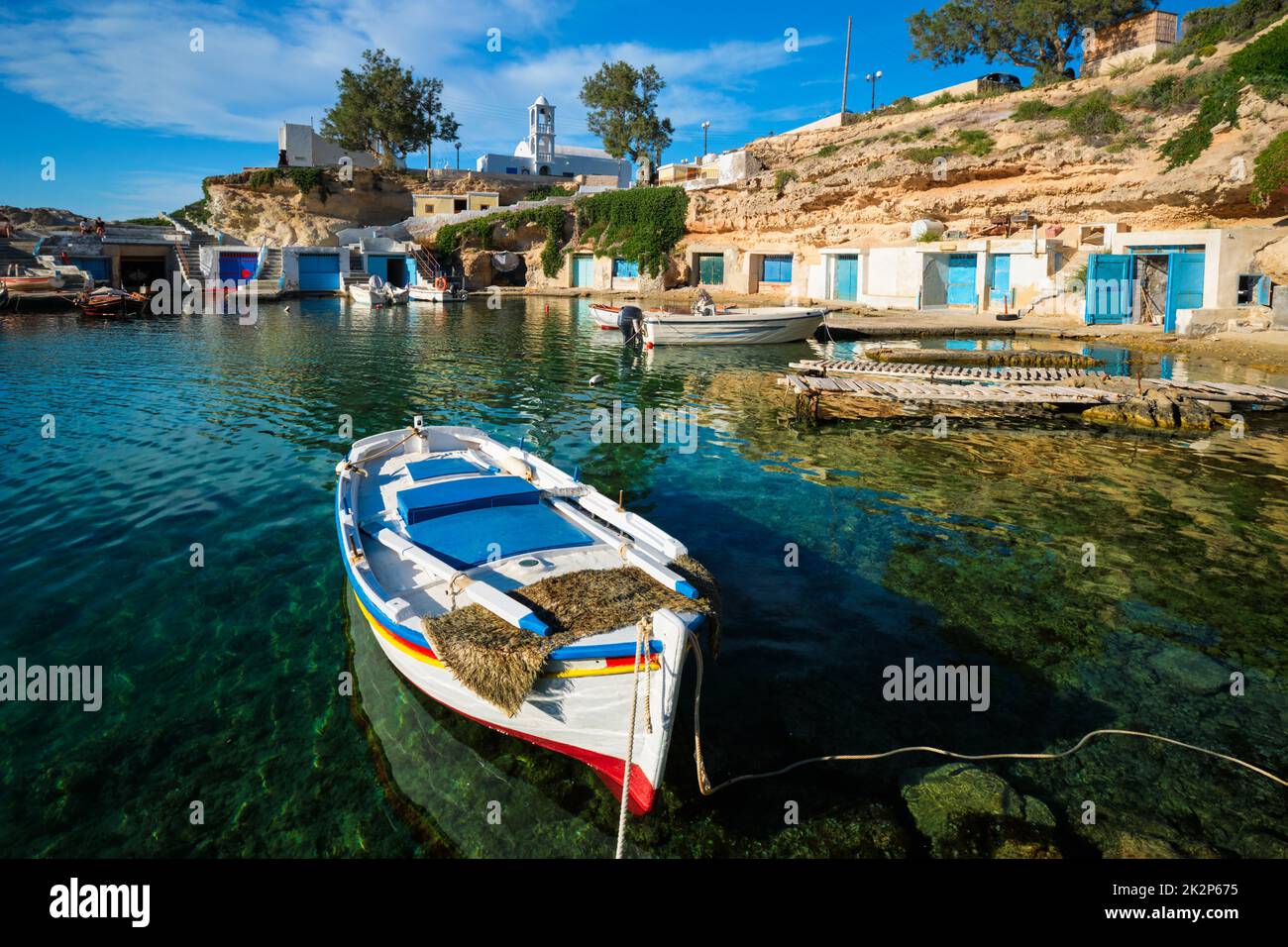 Fishing boats in harbour in fishing village of Mandrakia, Milos island ...