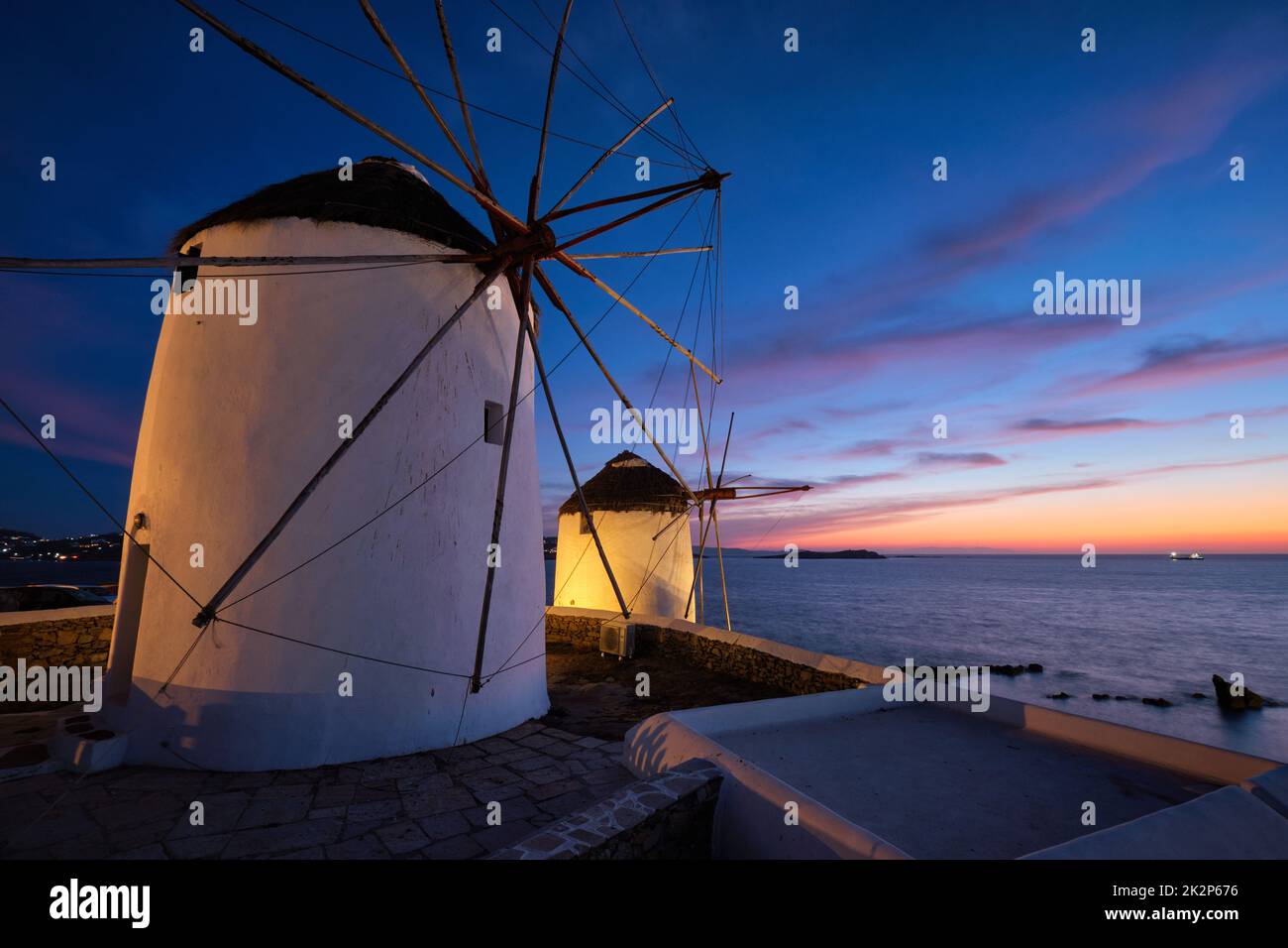 Traditional greek windmills on Mykonos island at sunrise, Cyclades ...