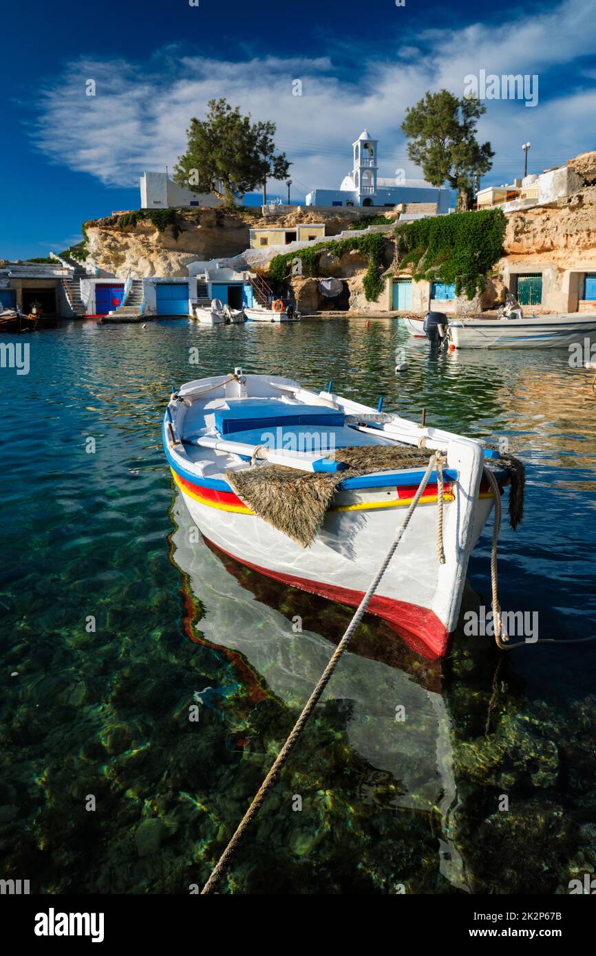 Fishing boats in harbour in fishing village of Mandrakia, Milos island ...