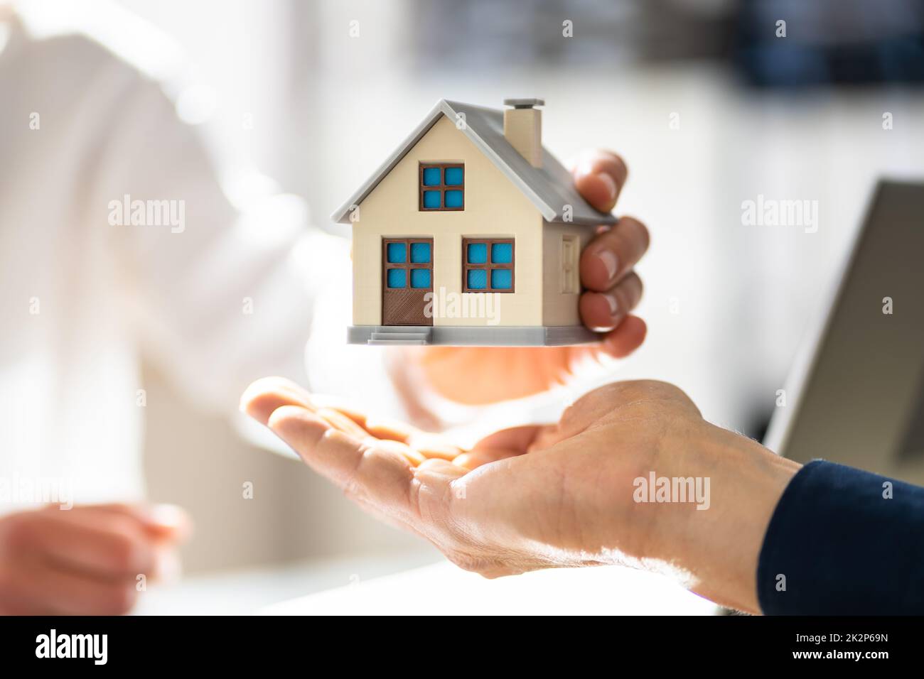 Real Estate House Handover. Agent Giving Property Stock Photo - Alamy