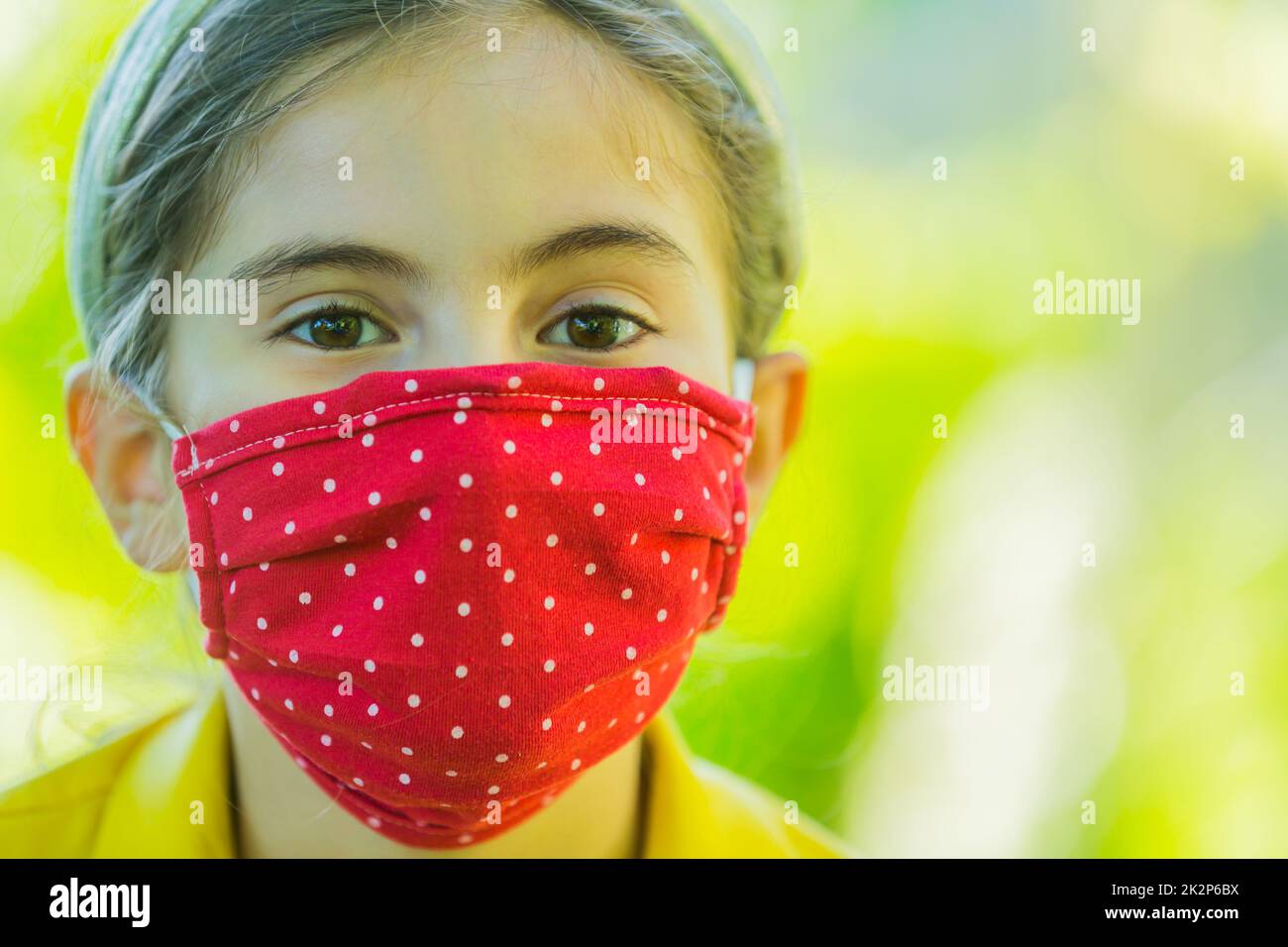 Little girl with mask Stock Photo - Alamy