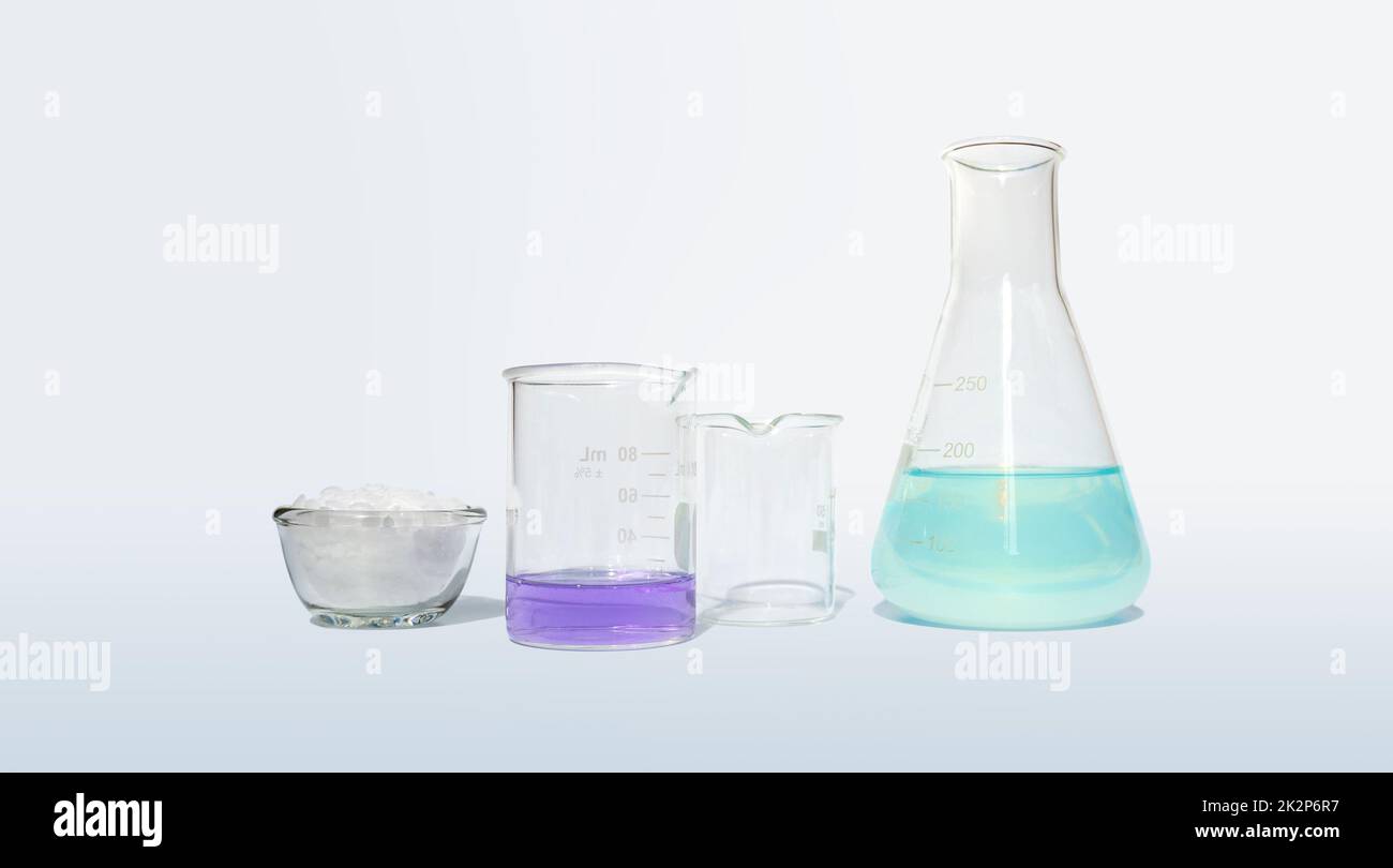 Microcrystalline wax in glass container glass place next to Potassium ...