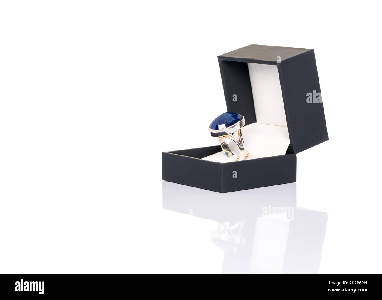Blue Sapphire Jewel or gems ring in dark blue jewel box. Collection of ...