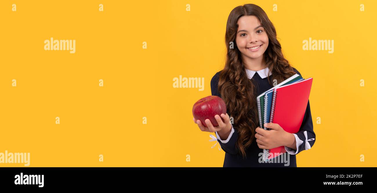 teen girl hold apple after study. healthy childhood. happy kid going to ...