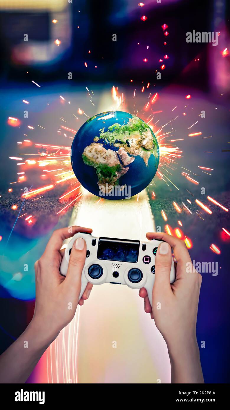 Games played around the world. Hand and joystick. Macro world ...