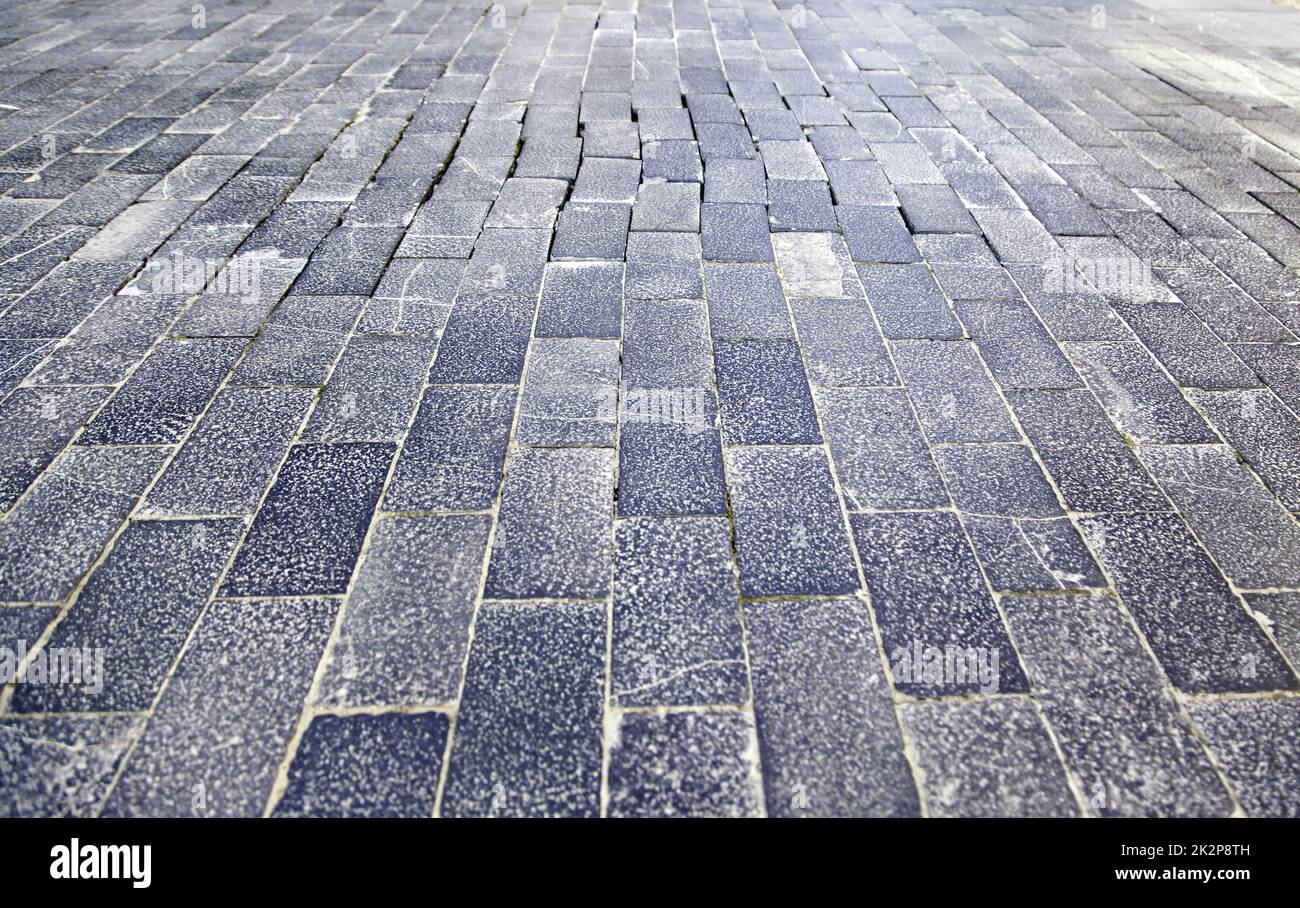 Damaged cobblestone floor Stock Photo - Alamy