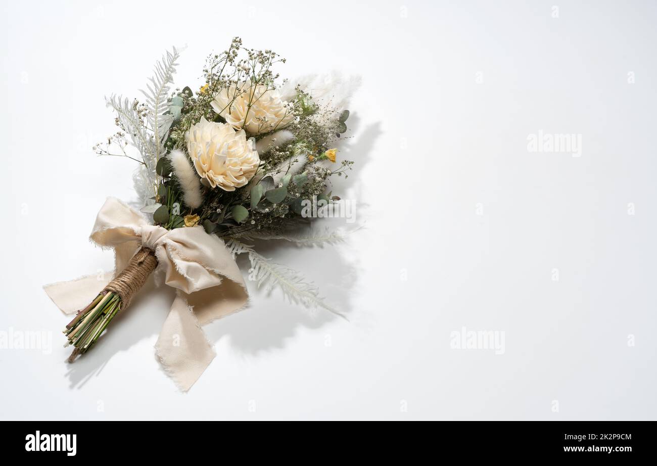 Bouquet of dried flowers placed on white background Stock Photo - Alamy
