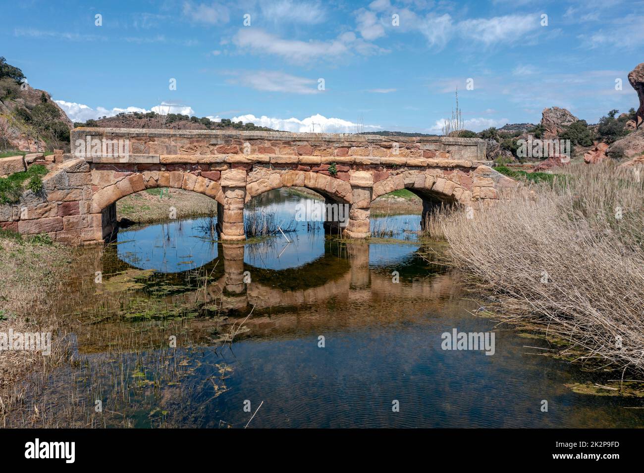 Renaissance bridge from the 17th century over the Salado river. Riba de ...