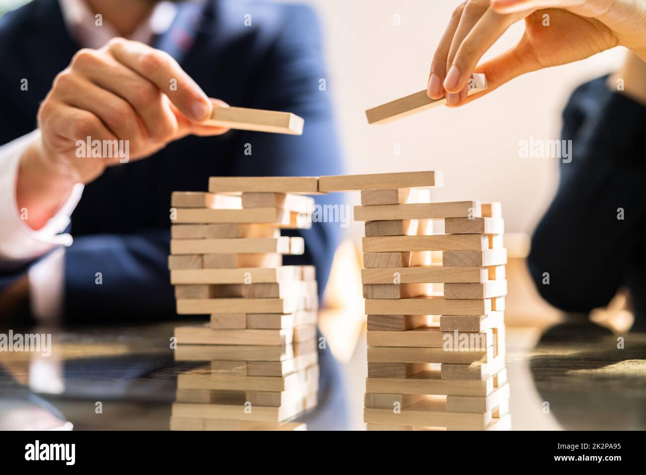 Human's Hand Placing Wooden Block Stock Photo - Alamy