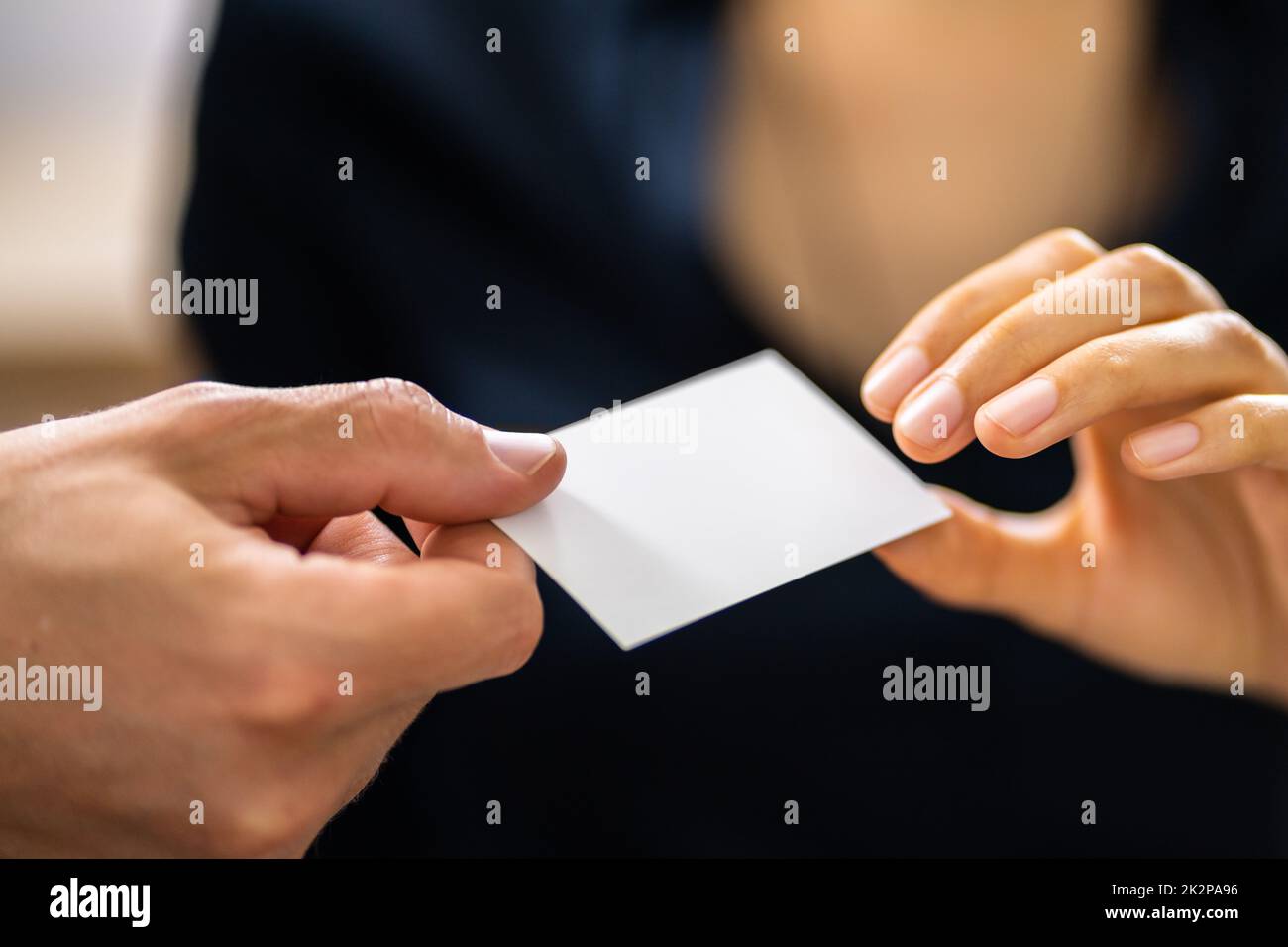 Person Hands Giving Visiting Card To Another Person Stock Photo - Alamy