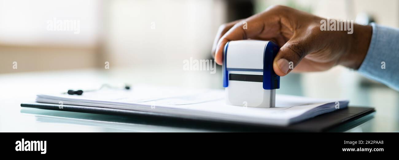 Public Notary Putting Company Stamp On Contract Stock Photo - Alamy