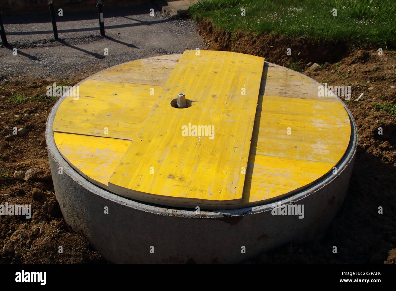 The manhole was provisionally covered with a wooden cover Stock Photo ...