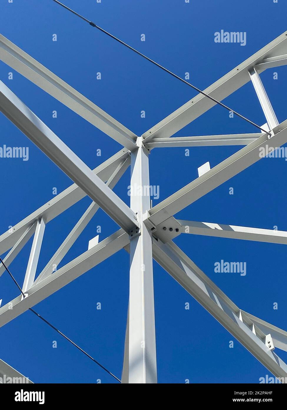 A vertical shot of steel columns and beams on a construction site under ...