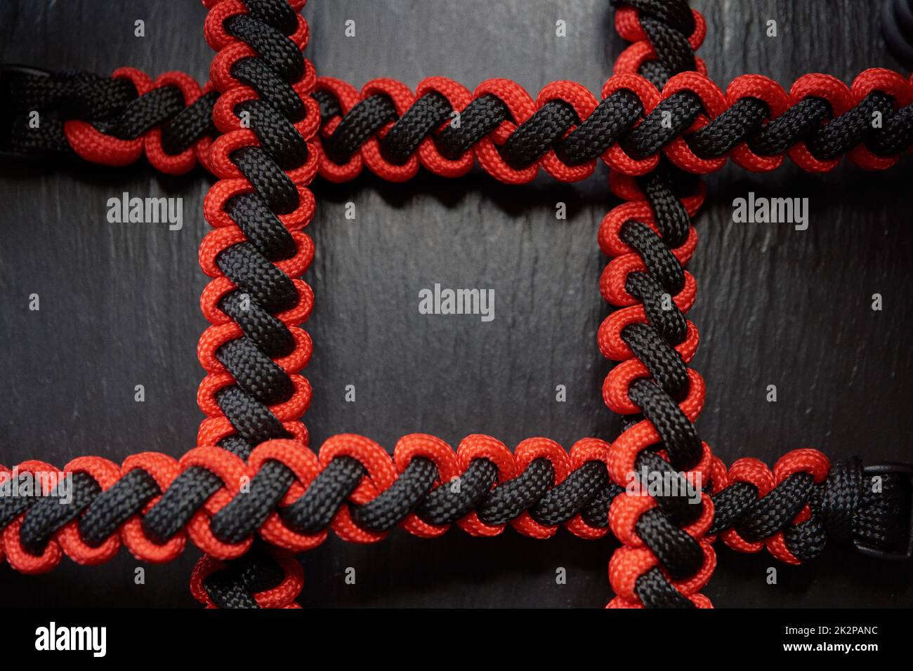 handmade woven paracord string bracelet Stock Photo - Alamy