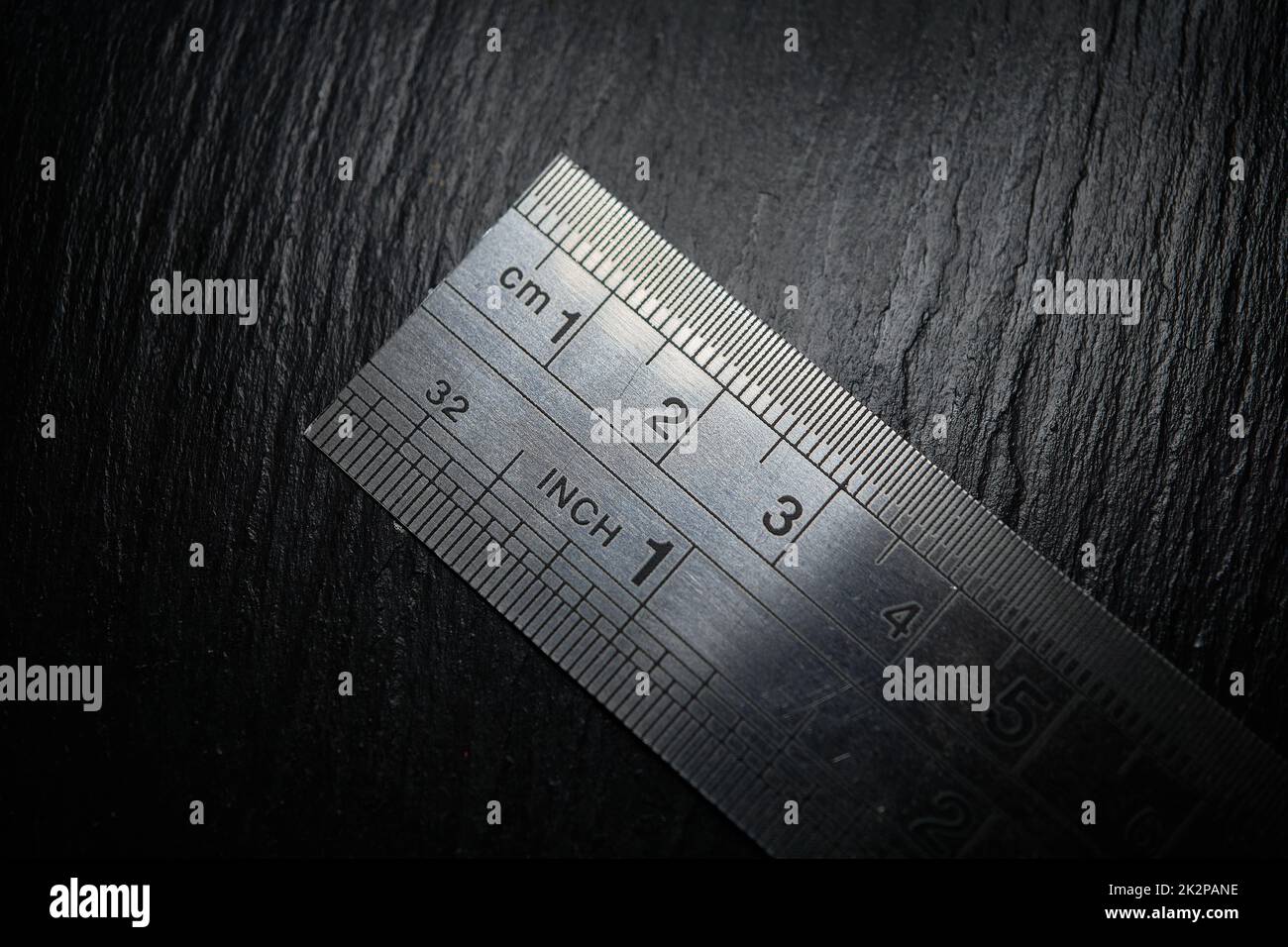 tip of the material metal ruler Stock Photo - Alamy