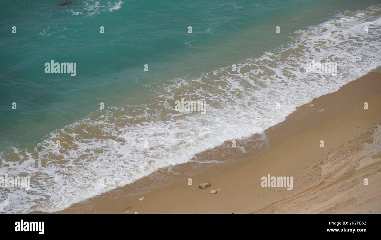 Beautiful seashore in summer. Calm blue sea landscape. Stony and sandy ...