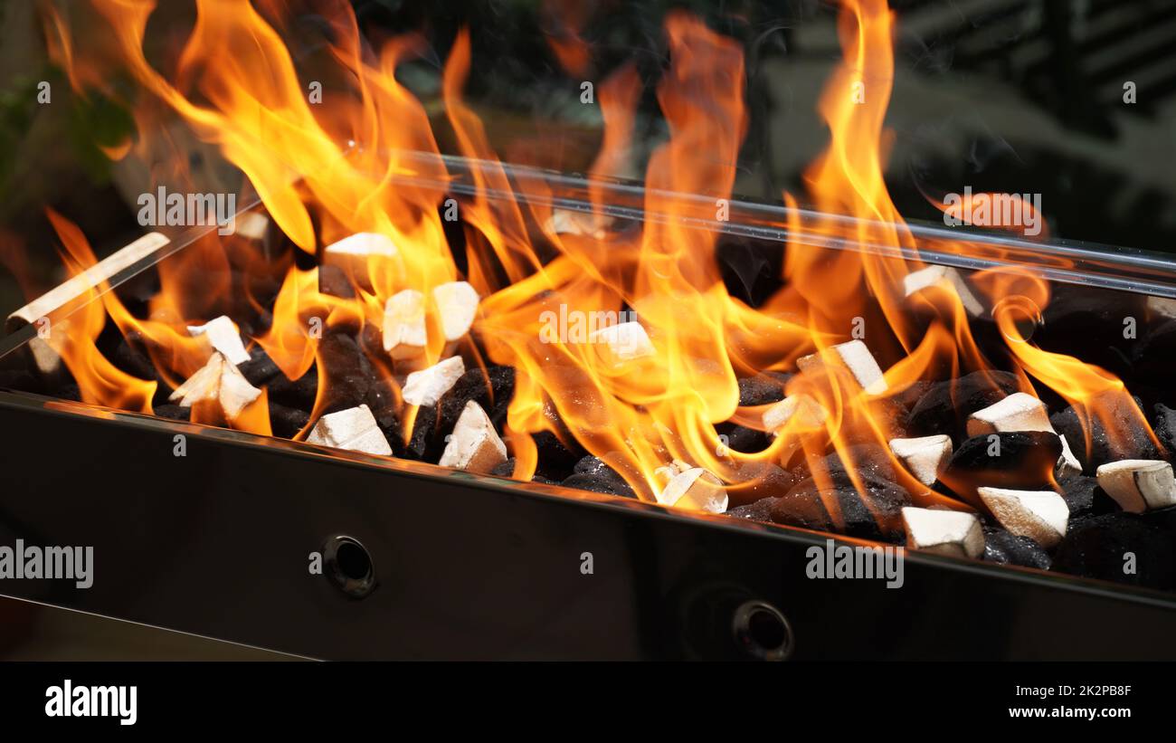 Empty Barbecue Flaming Grill Close Up With Bright Flames And White ...