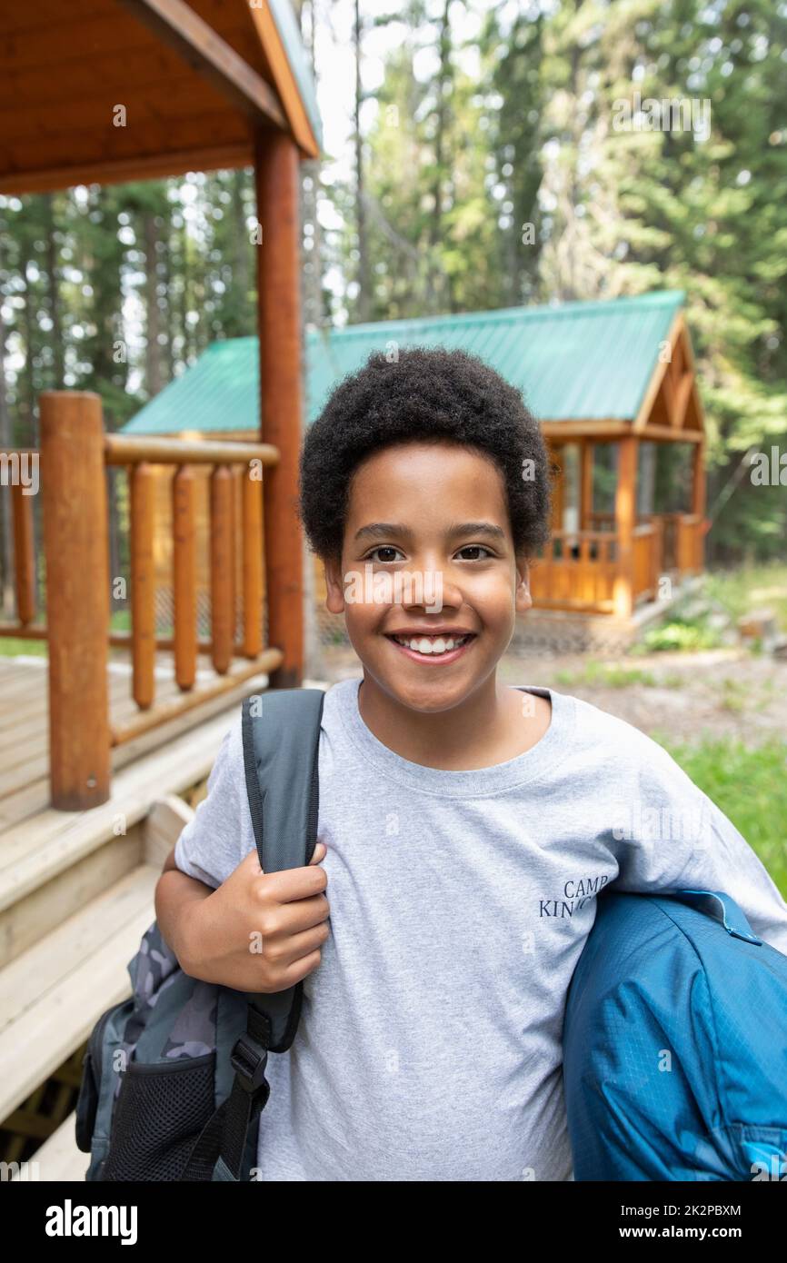 Boy smile backpack hi-res stock photography and images - Alamy
